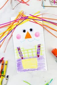 Colorful Paper Bag Scarecrow Puppet Craft for Kids | Tonya Staab